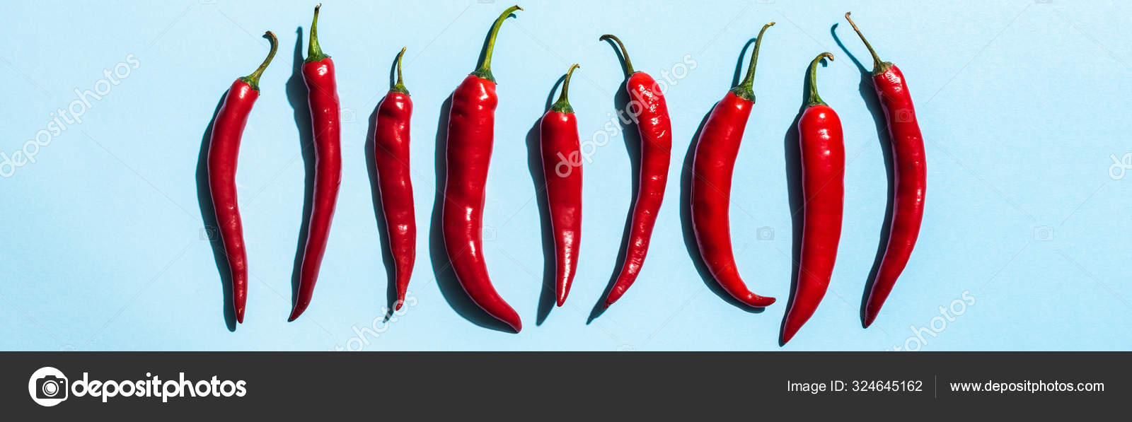 Top View Chili Peppers Shadow Blue Surface Panoramic Shot Stock Photo ...