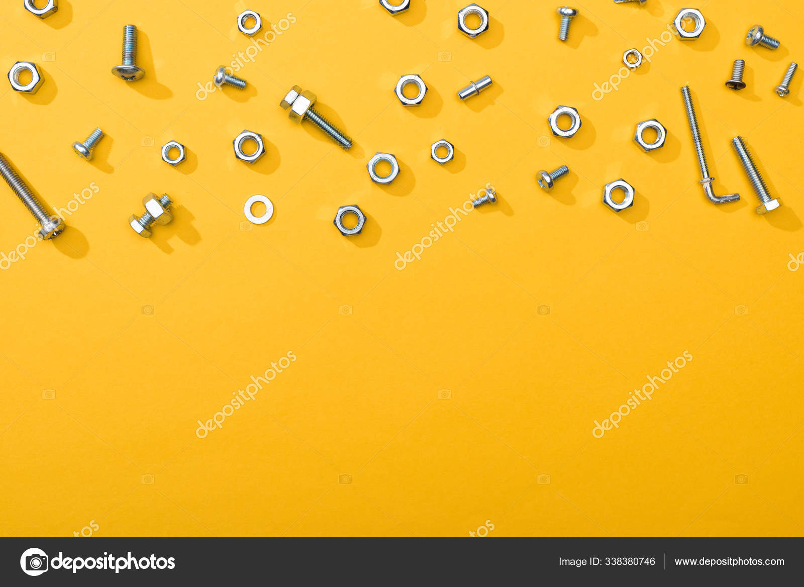 Top View Metal Nuts Bolts Yellow Background Copy Space Stock Photo by ...