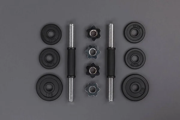 Metal barbells and weights — Stock Photo © AntonMatyukha #160185152