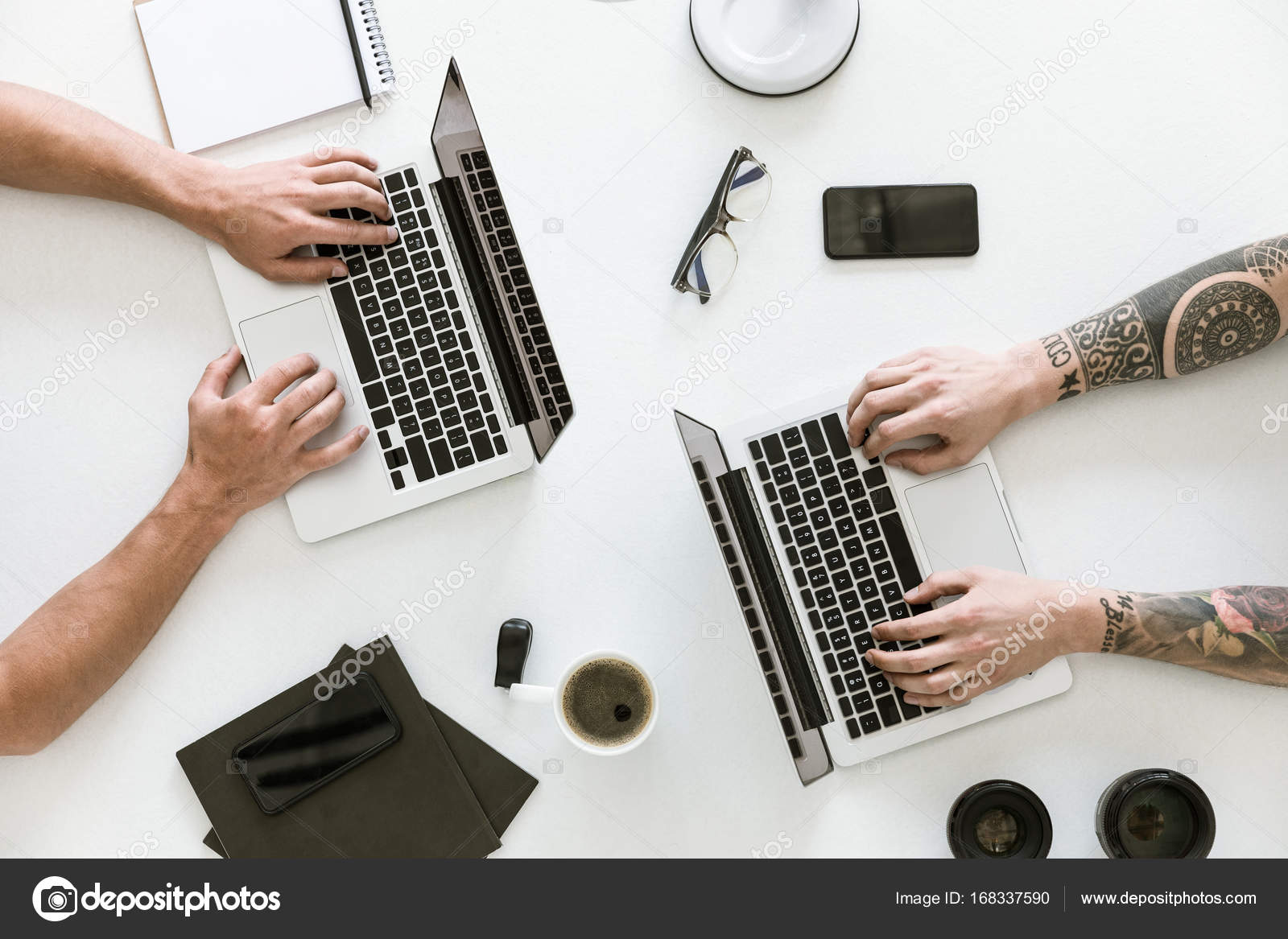 Two men working with laptops — Stock Photo © AntonMatyukha #168337590 Two men working with laptops — Stock Photo © AntonMatyukha #168337590