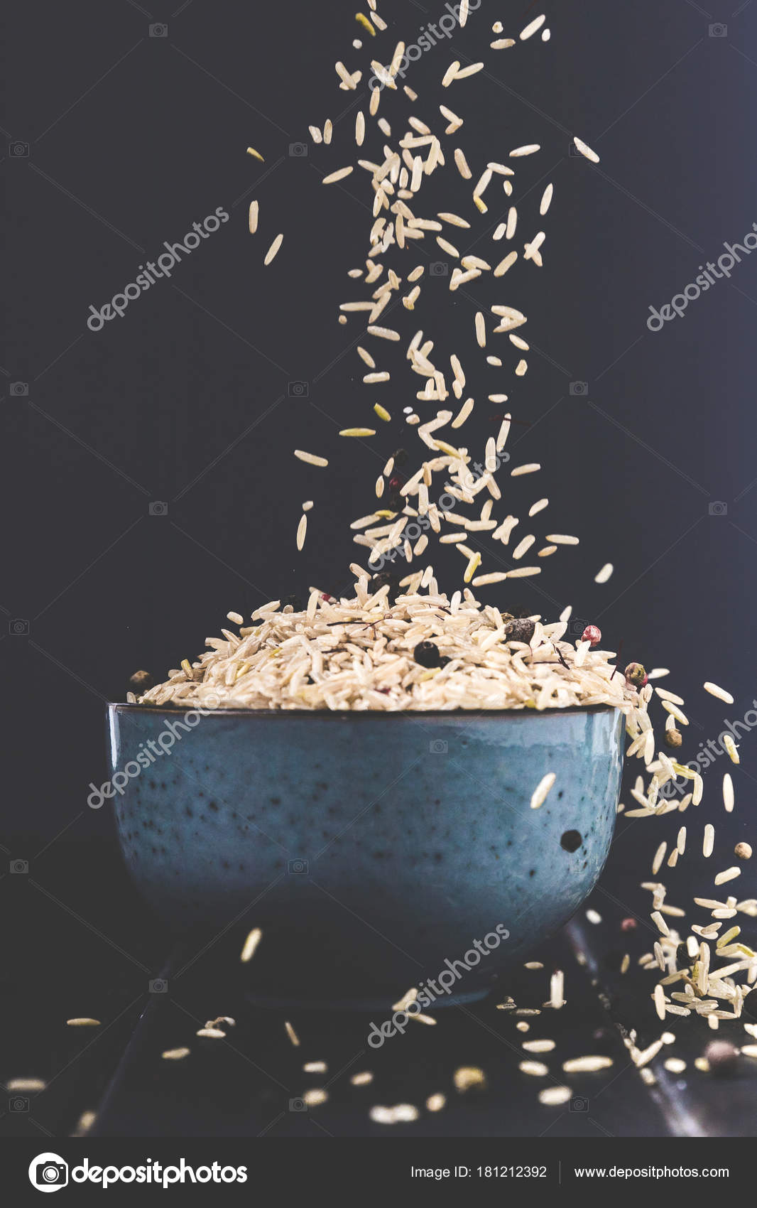 Close Shot Rice Spilling Bowl Black Table Stock Photo by ©AntonMatyukha ...