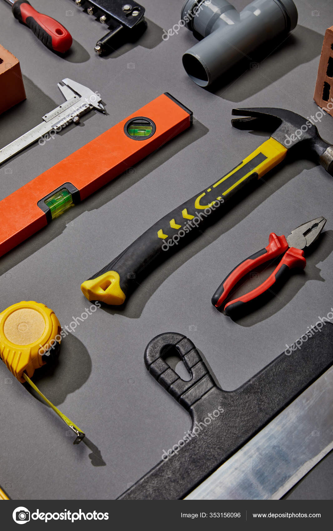 Flat Lay Measuring Tape Calipers Hammer Screwdriver Brush Angle Keys ...