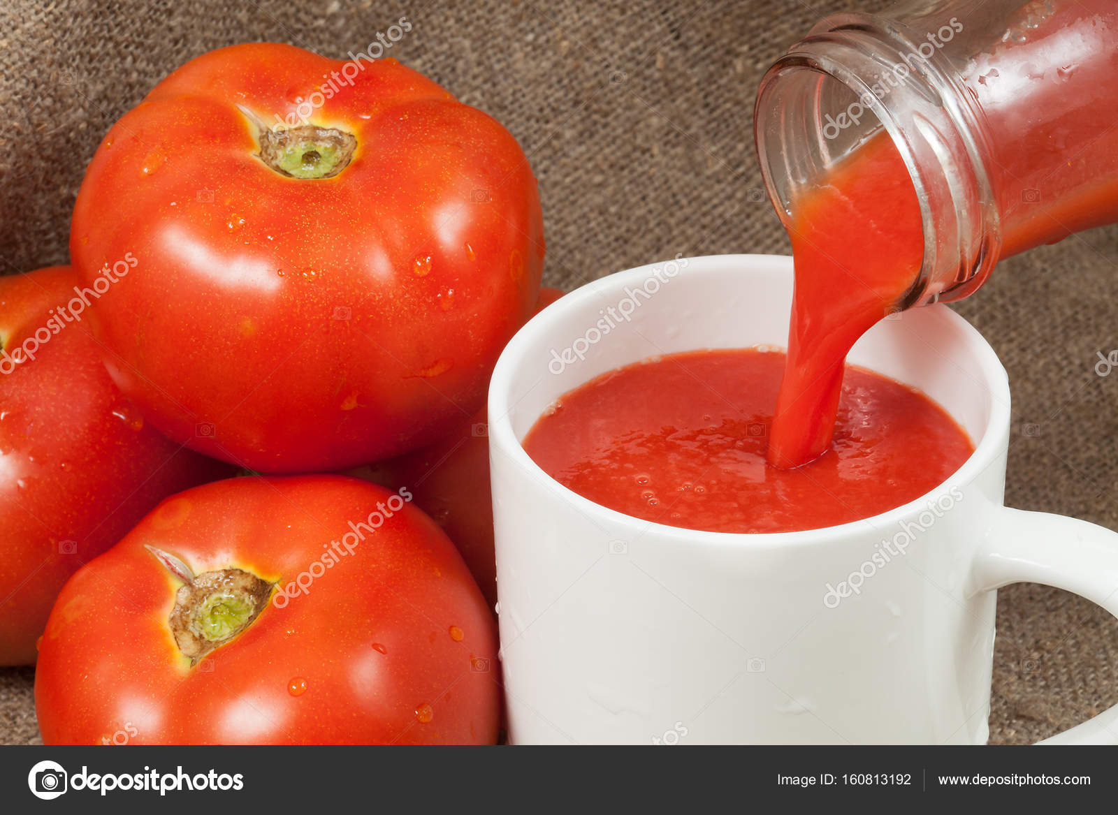 Tomato juice poured in cup Stock Photo by ©Dima_Aslanian 160813192