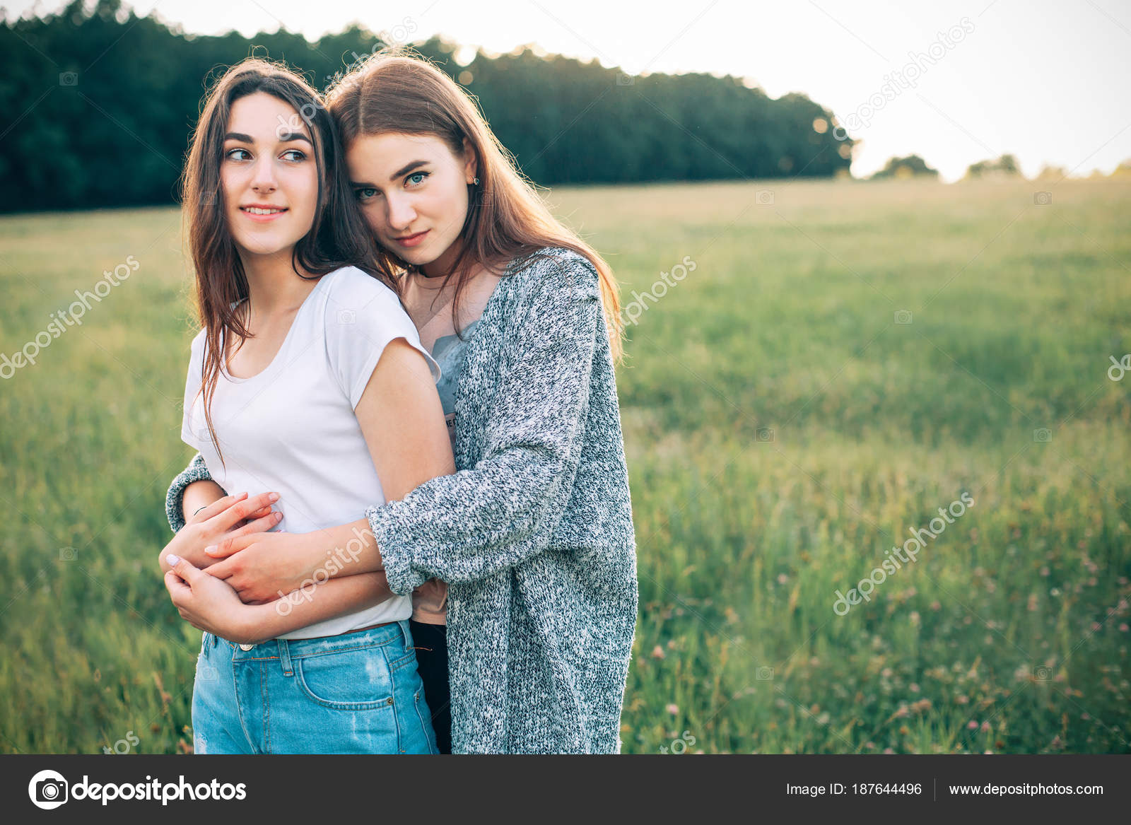 Two Girls Hugging Green Field Daytime Stock Photo by ©Dima_Aslanian ... Two Girls Hugging Green Field Daytime Stock Photo by ©Dima_Aslanian ...