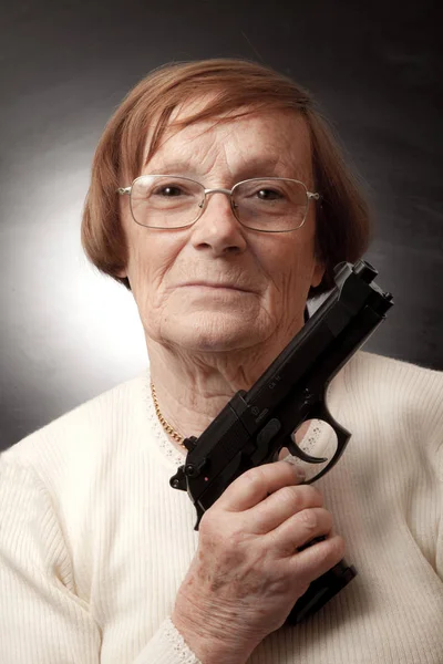 Grandma with gun Stock Photos, Royalty Free Grandma with gun Images ...