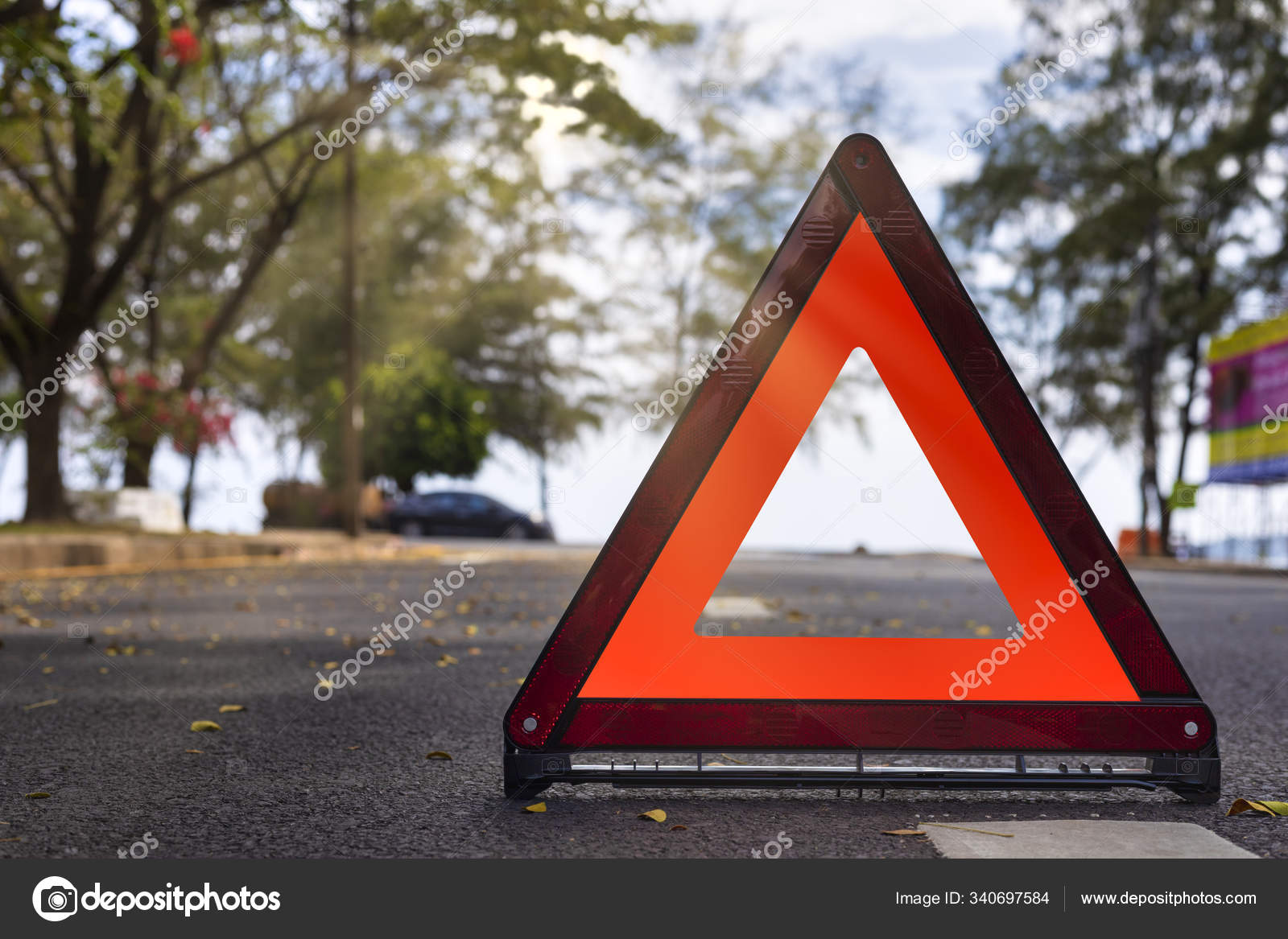 Red triangle, red emergency stop sign, red emergency symbol on road ...