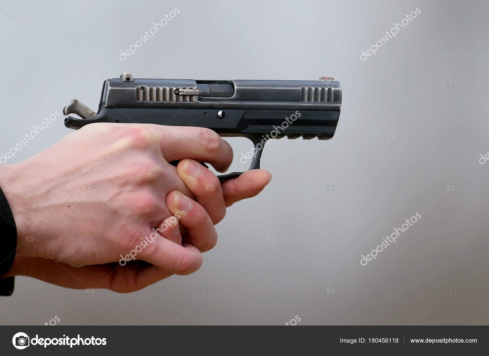 Holding A Pistol With Two Hands