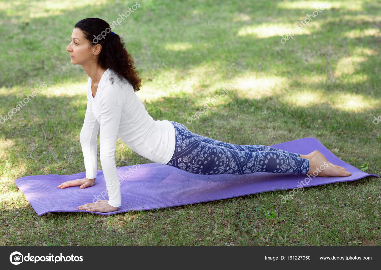 A Yoga Girl Working Out In A Sunny Park Simple Morning Exercises Relaxing Asanas Practice