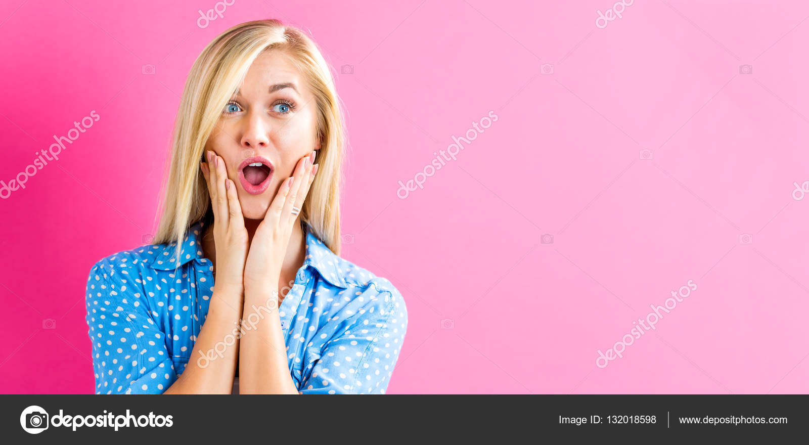 Surprised young woman posing Stock Photo by ©Melpomene 132018598