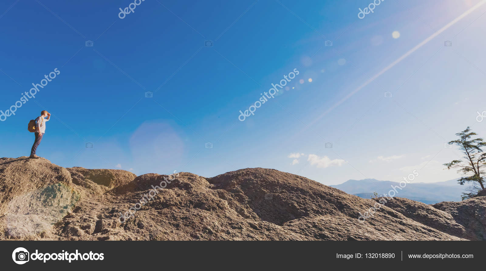 Man walking on the edge of a cliff Stock Photo by ©Melpomene 132018890