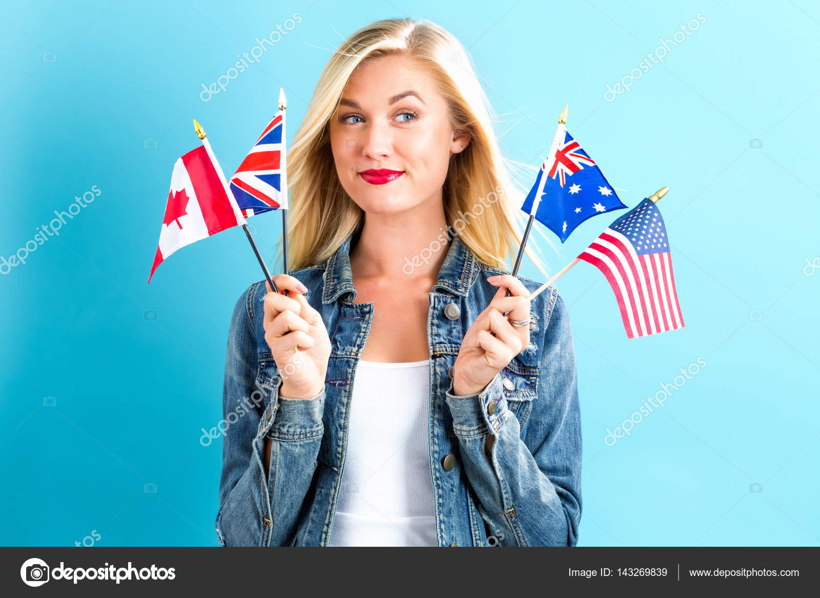 Young woman with flags — Stock Photo © Melpomene #143269839