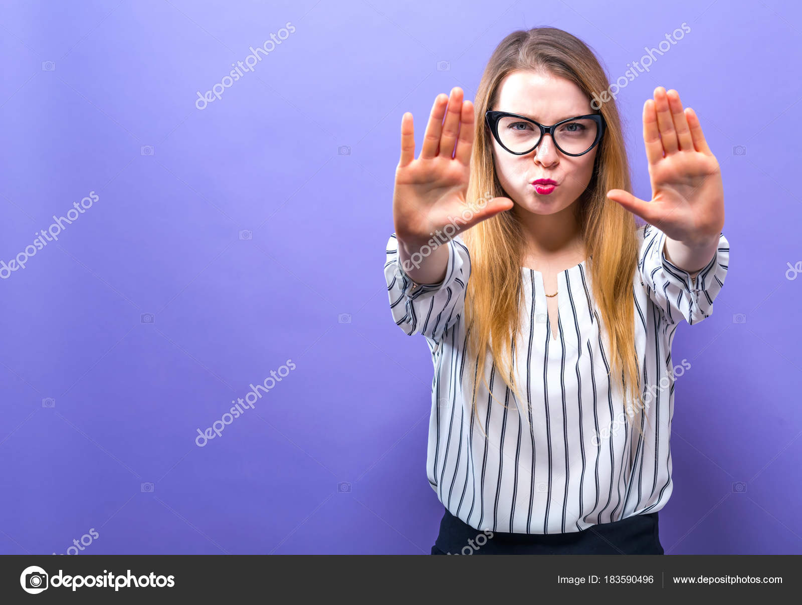 Young woman making a rejection pose Stock Photo by ©Melpomene 183590496