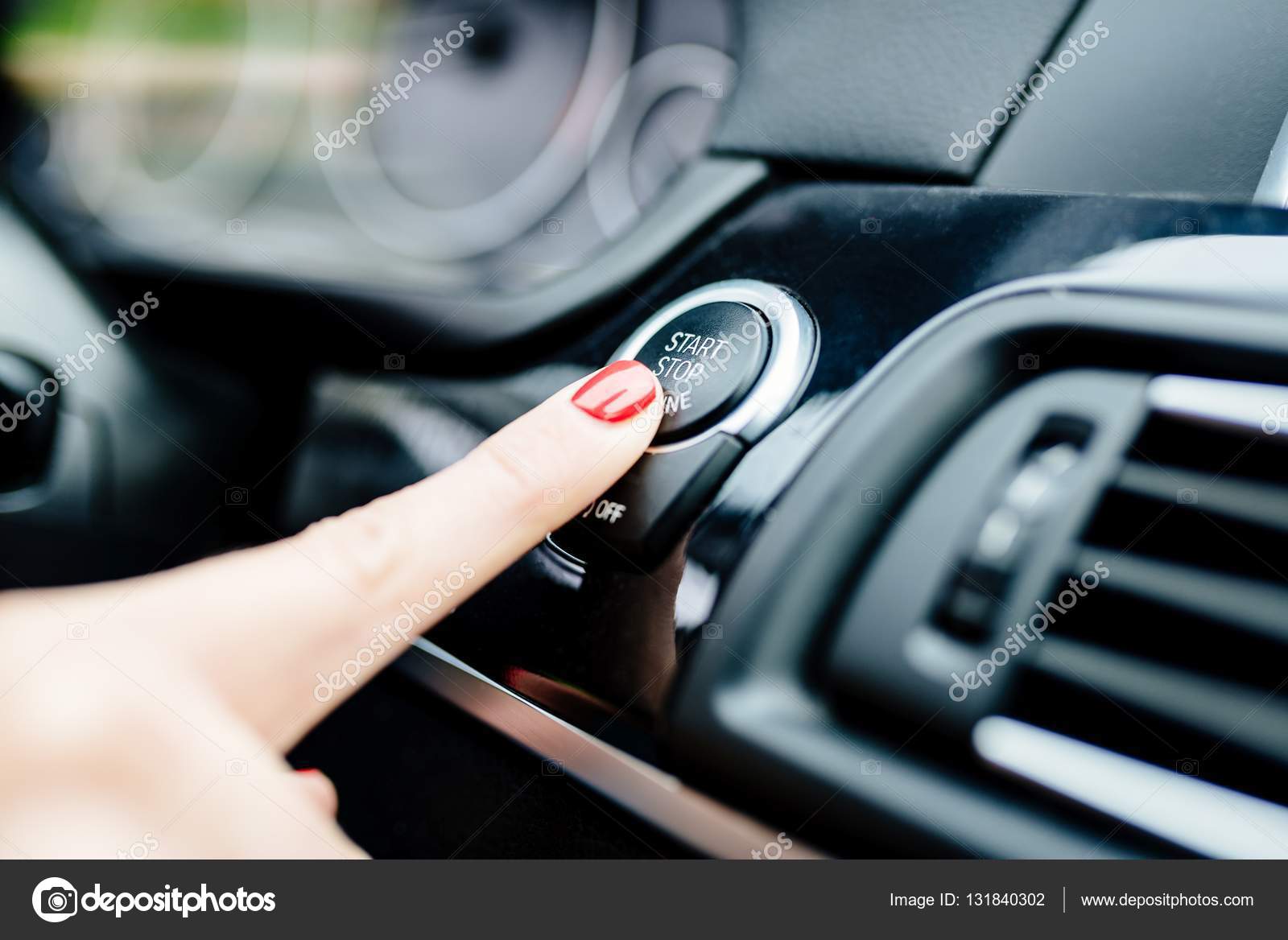 Woman starts the car engine with start-stop button — Stock Photo ...
