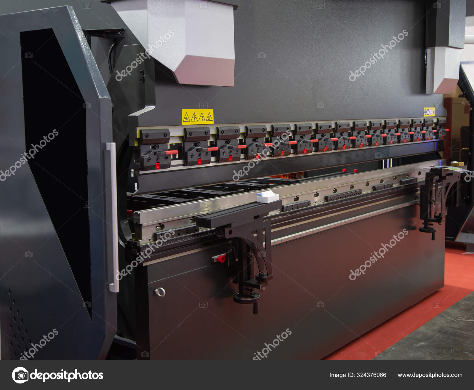 CNC Hydraulic Press Brake — Stock Photo © isampuntarat@gmail.com #324376066