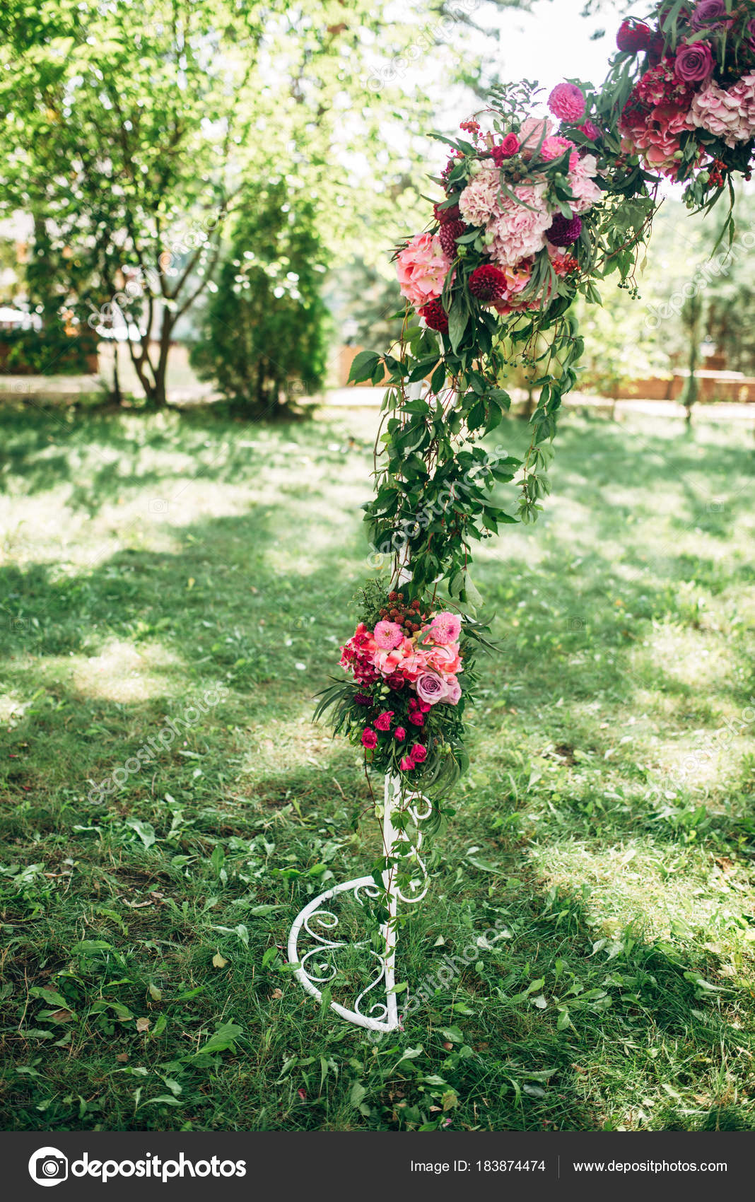 Wedding ceremony in forest. Arch decorated purple and red flowers Stock ...