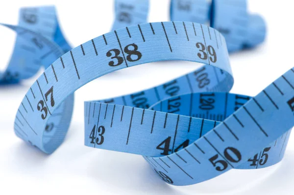 Close up of blue measuring tape for health concept, isolated on - Stock ...