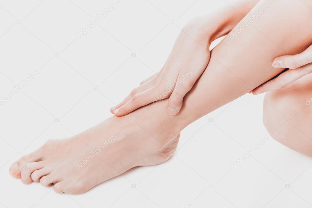 Womens feet on white background. — Stock Photo © Marcinska #162191966