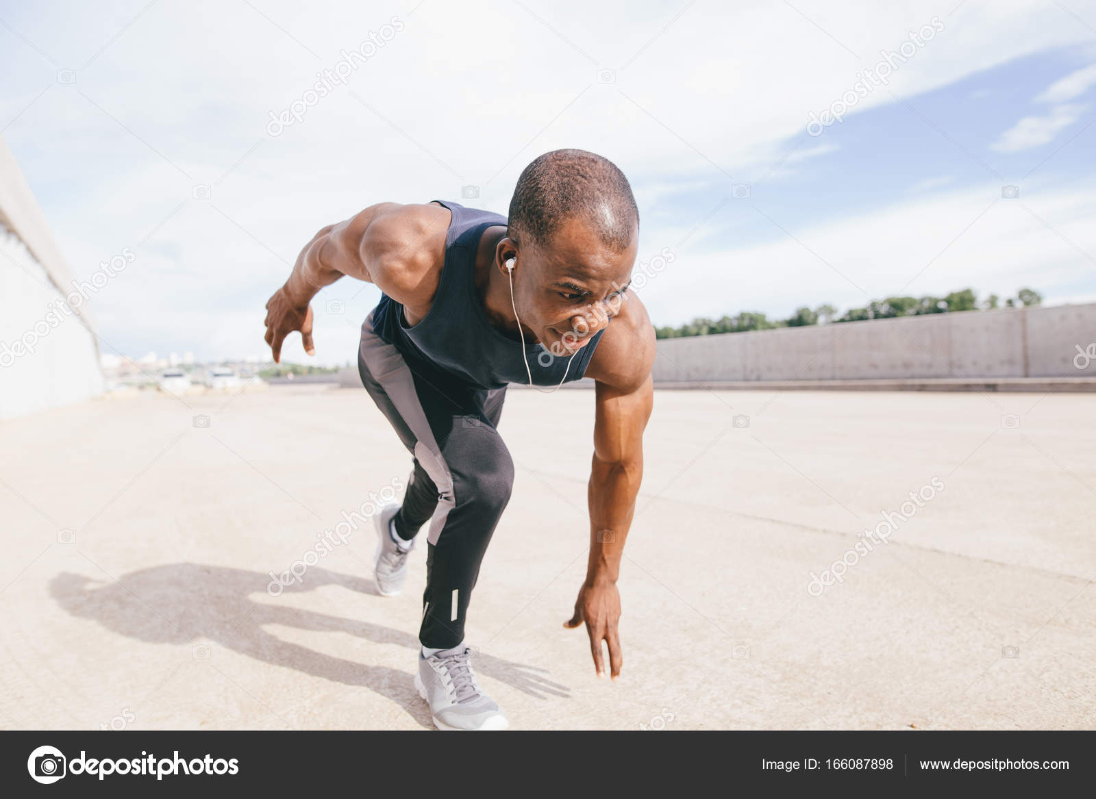 Front view Man start running on with blue sky in the background ⬇ Stock ...