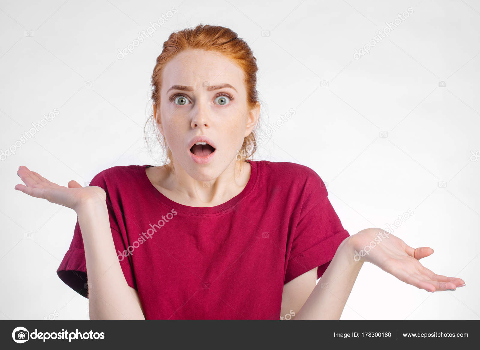 Young woman shrugging her hands — Stock Photo © ufabizphoto #178300180
