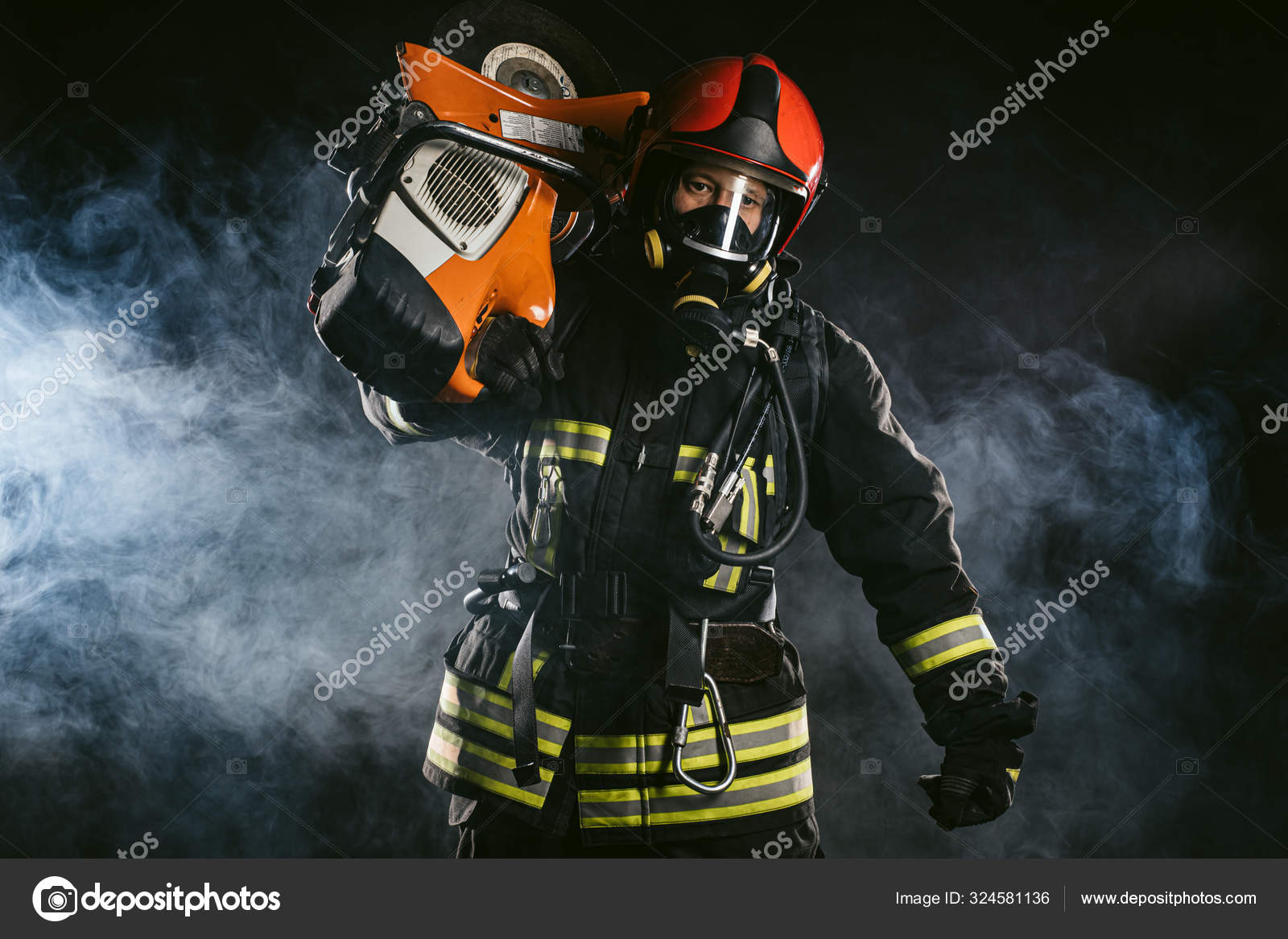 Hero man saving people from fire — Stock Photo © ufabizphoto #324581136
