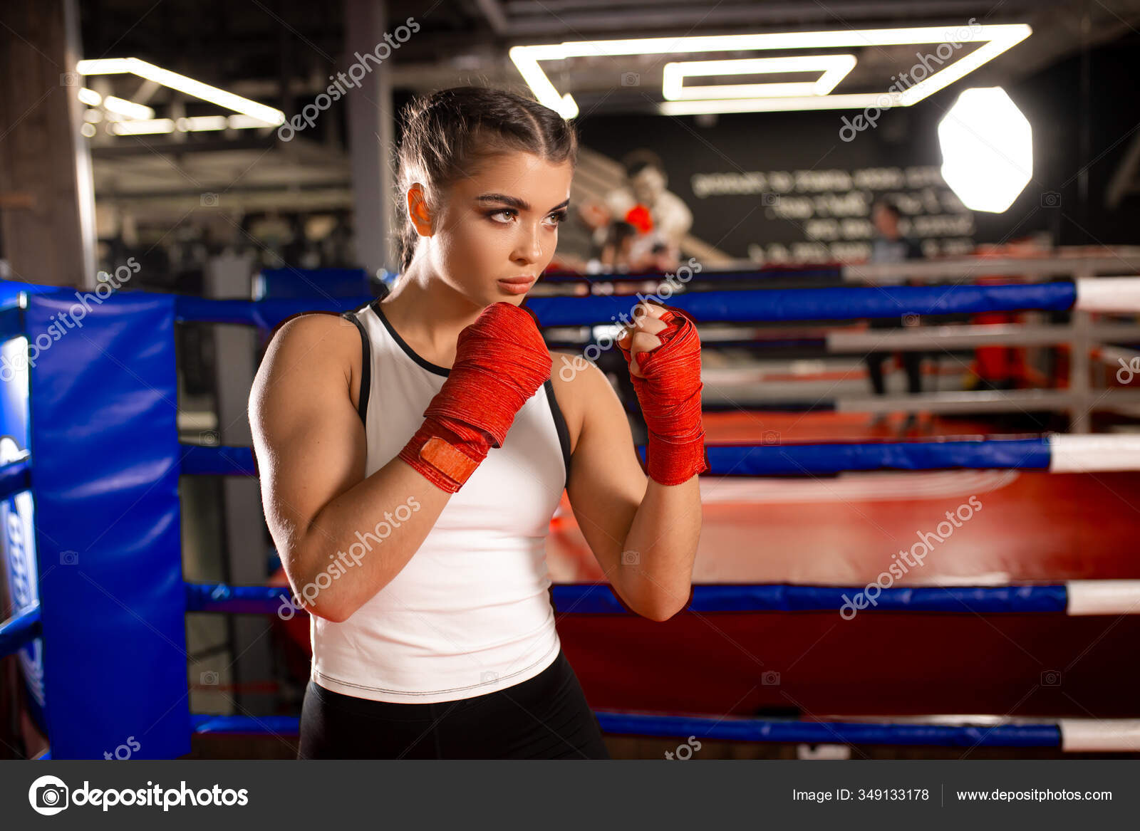 Strong female boxer in ring — Stock Photo © ufabizphoto #349133178