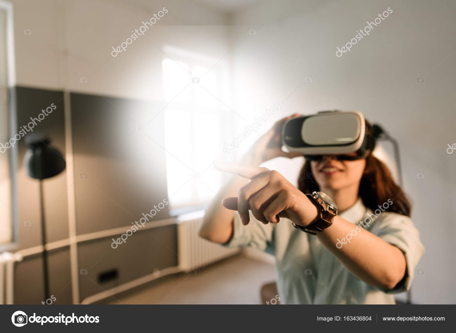 Joyful young girl VR headset Stock Photo by ©bnenin 163436804