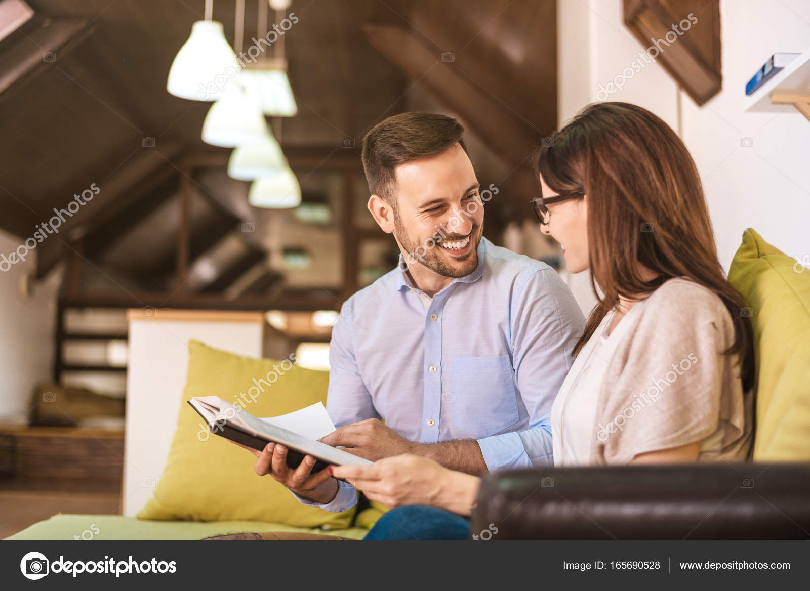Romantic couple reading book Stock Photo by ©bnenin 165690528