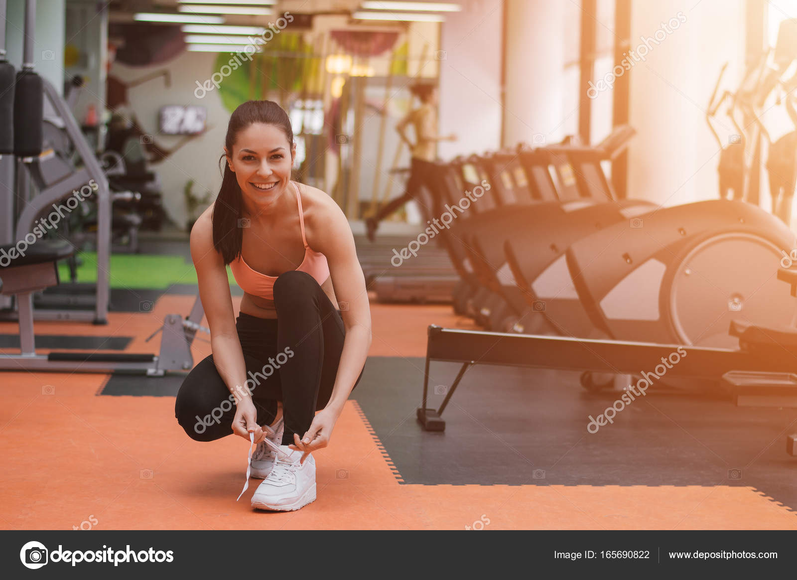 Girl getting ready for training Stock Photo by ©bnenin 165690822