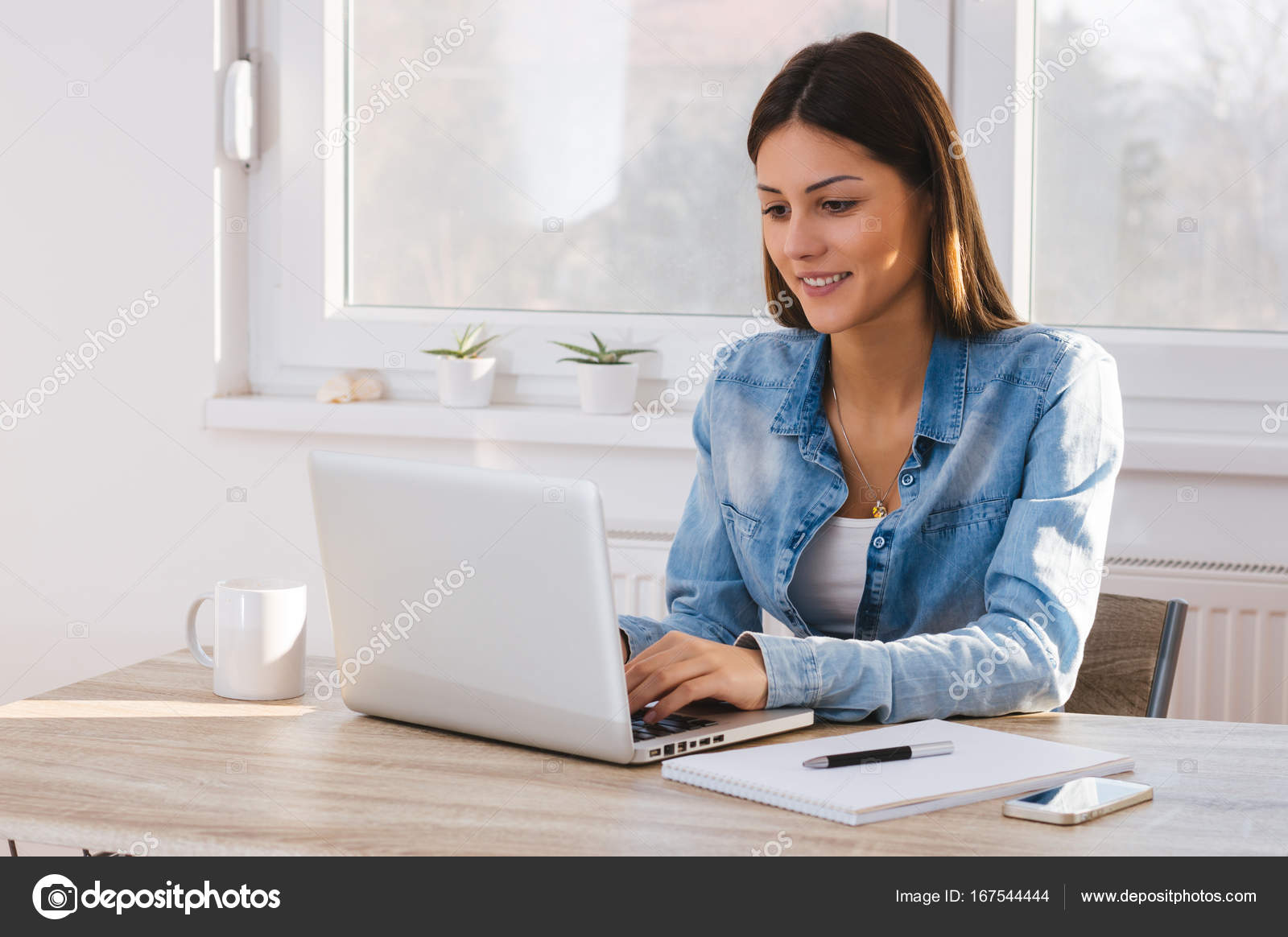 Young girl with laptop computer Stock Photo by ©bnenin 167544444