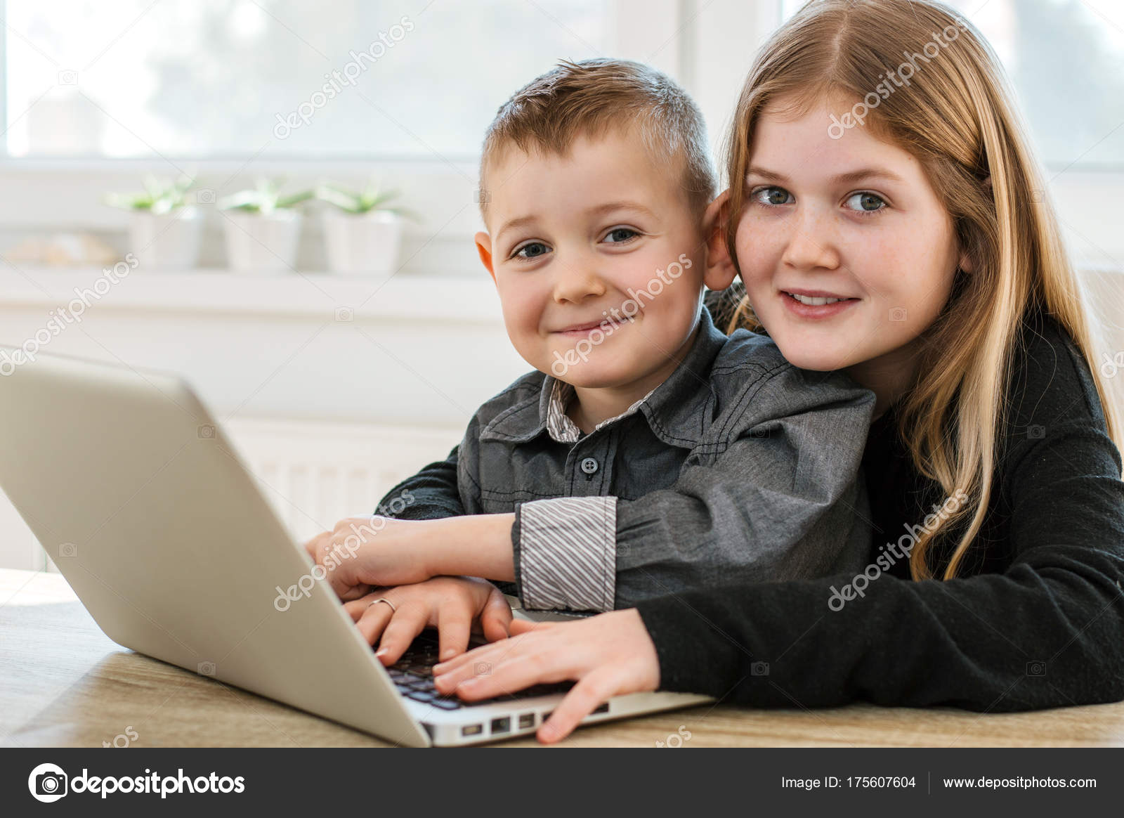 Kids playing on computer ⬇ Stock Photo, Image by © bnenin #175607604