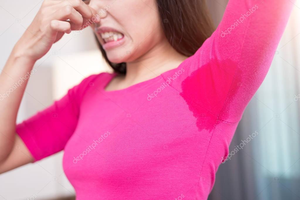 Woman with body odor problem — Stock Photo © ryanking999 #156209492