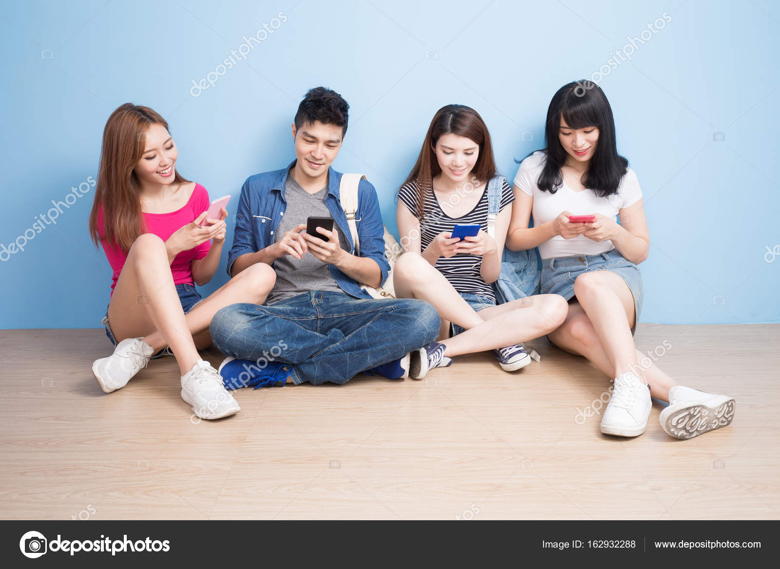 Students using smartphones — Stock Photo © ryanking999 #162932288
