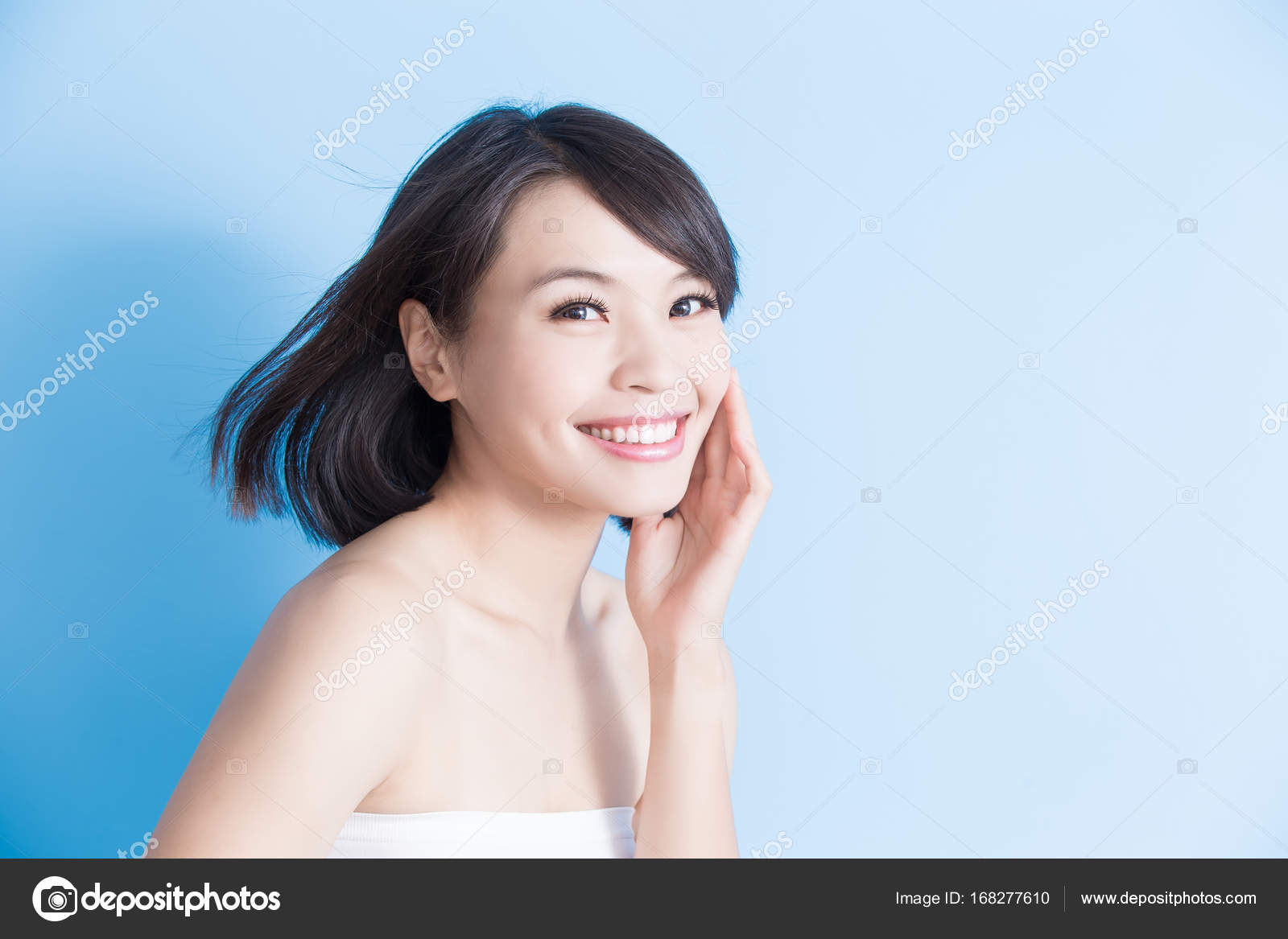 Beautiful woman smiling happily — Stock Photo © ryanking999 #168277610 Beautiful woman smiling happily — Stock Photo © ryanking999 #168277610