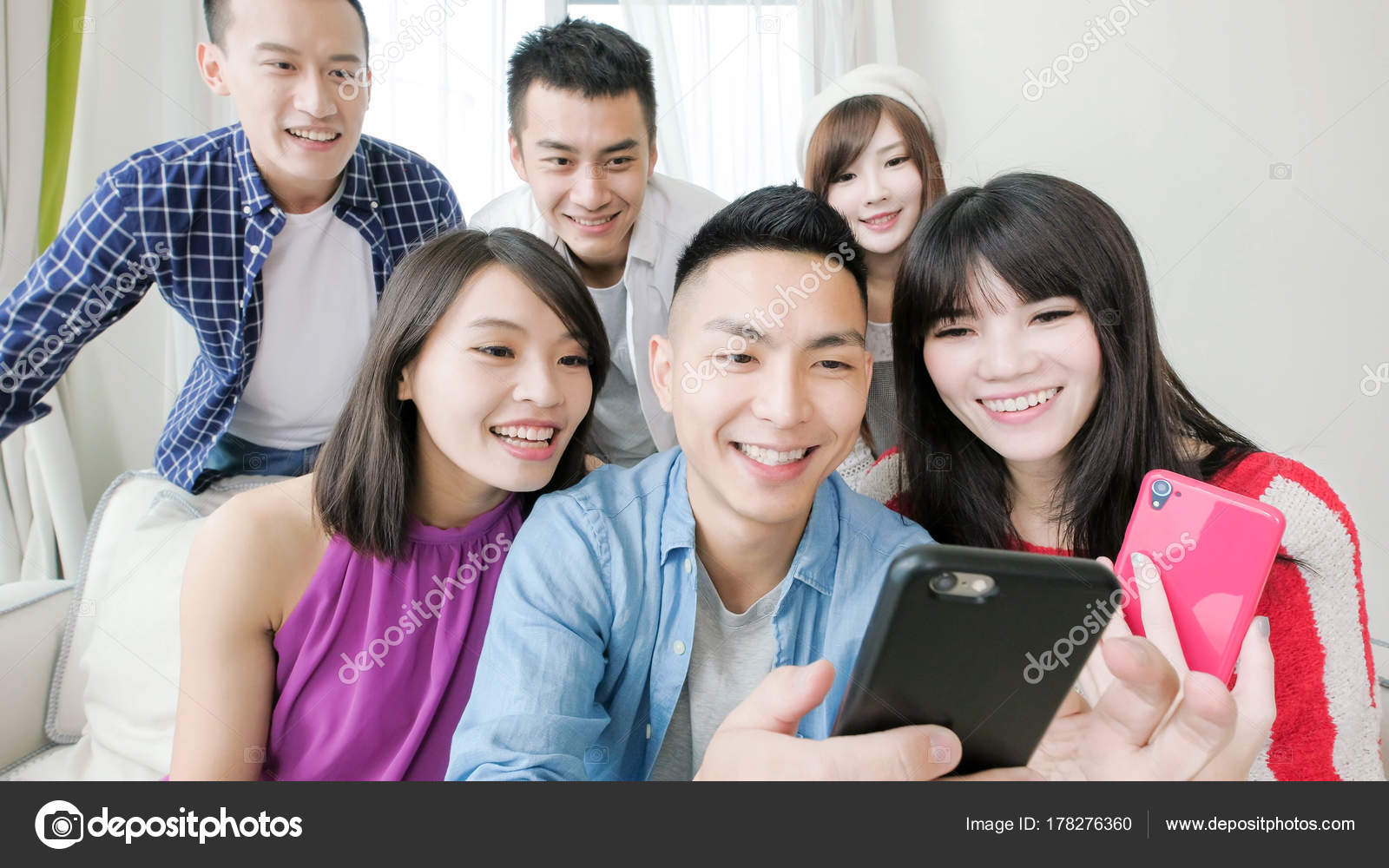 Young People Using Iphone