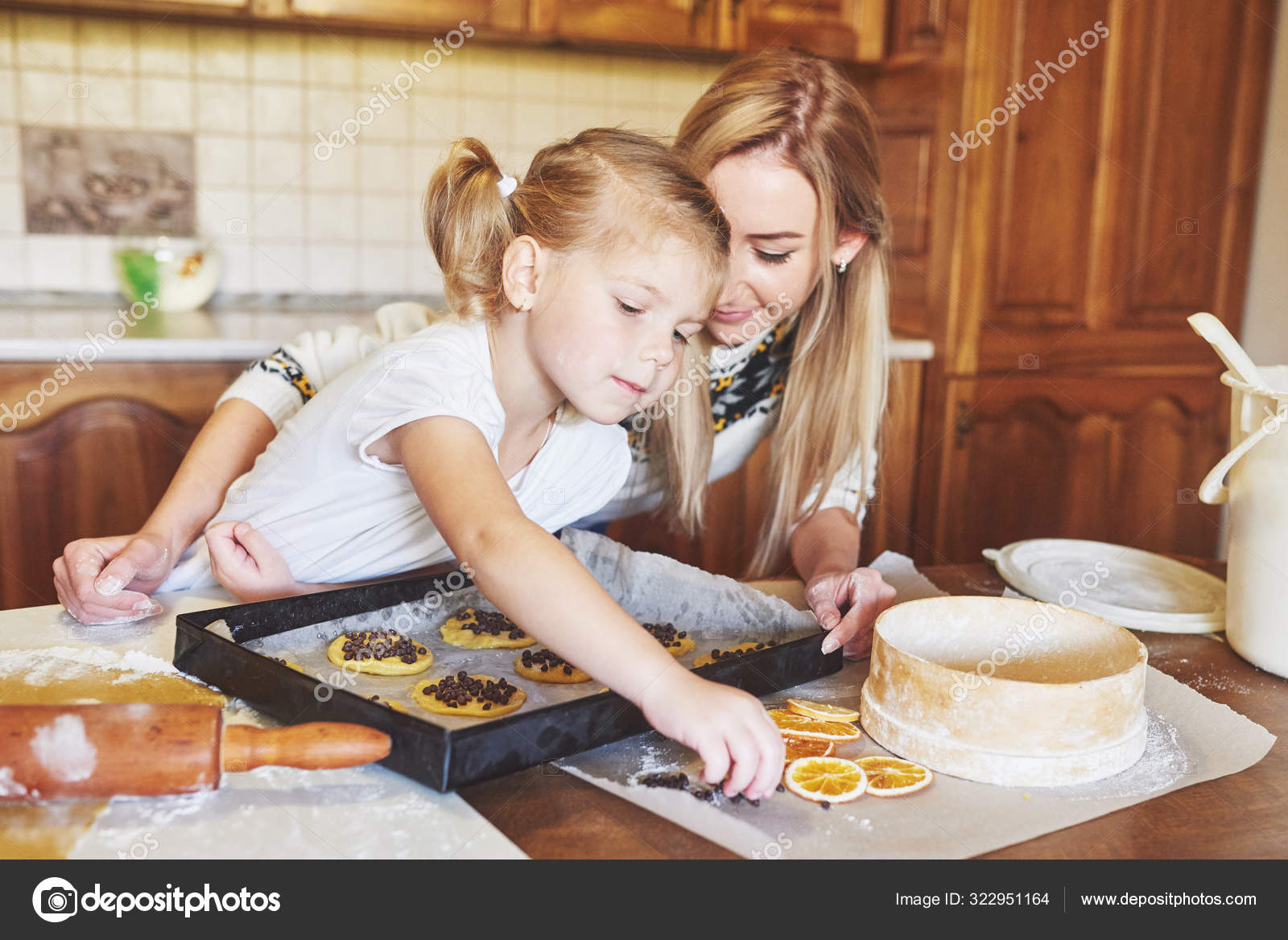 Happy Girl Her Mother Cook Cookies Stock Photo by ©myronstandret 322951164