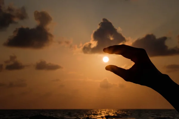 Sun in hands Stock Photos, Royalty Free Sun in hands Images | Depositphotos