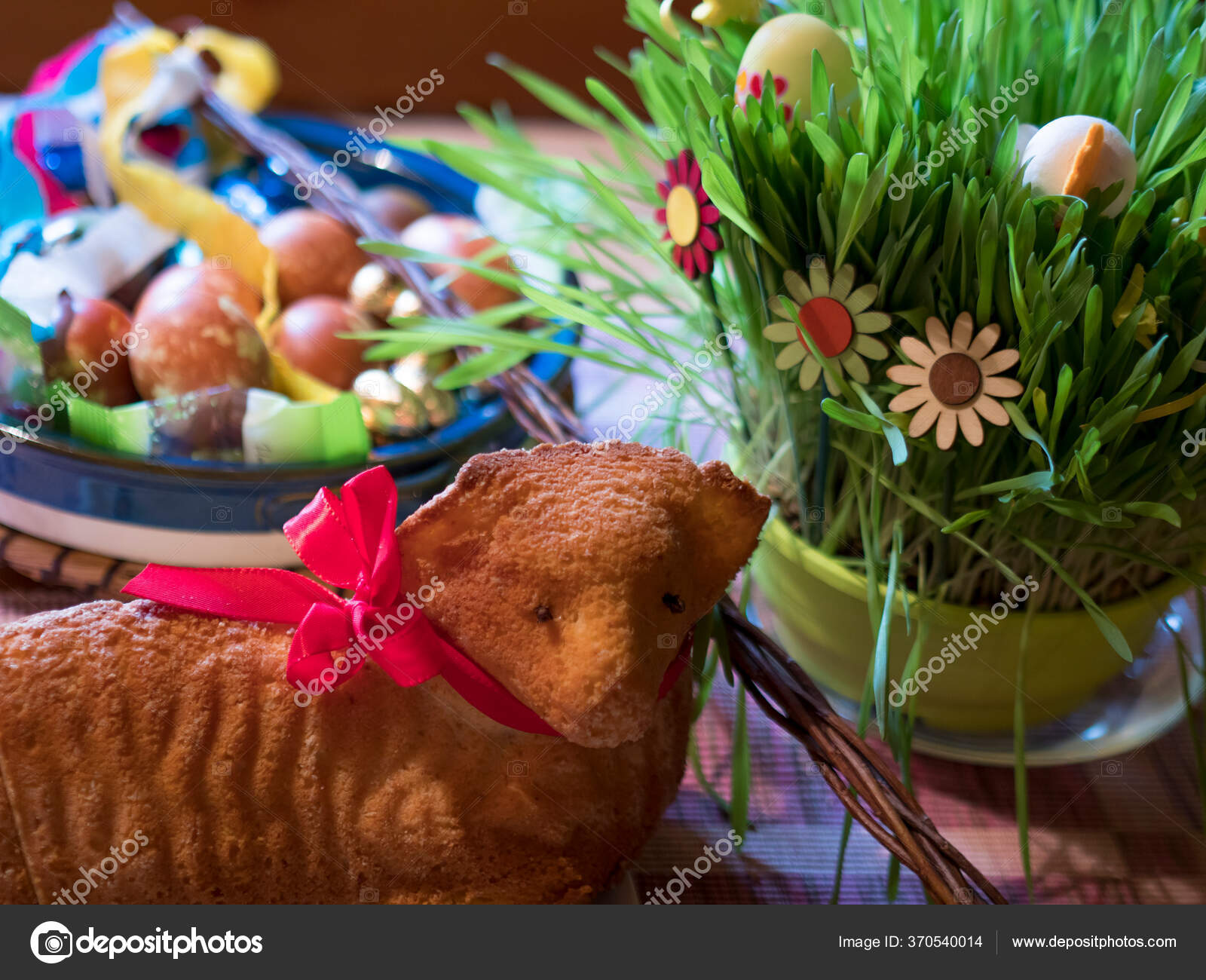 Homemade Paschal lamb cake and Colorful Painted easter eggs and ...