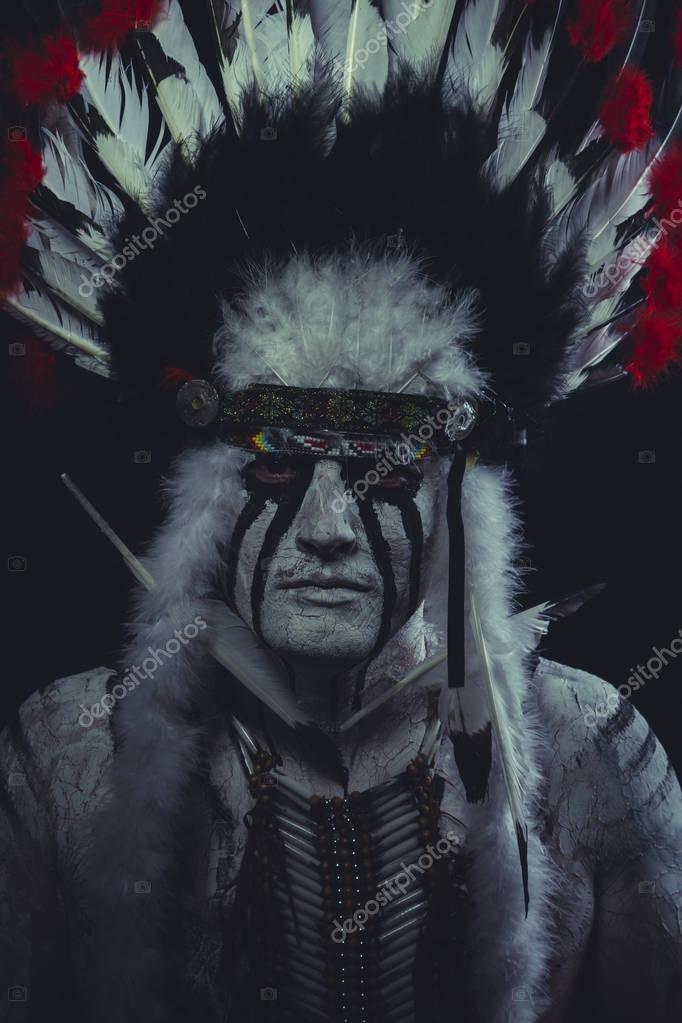 Indian chief posing in feathers headdress — Stock Photo © outsiderzone ...