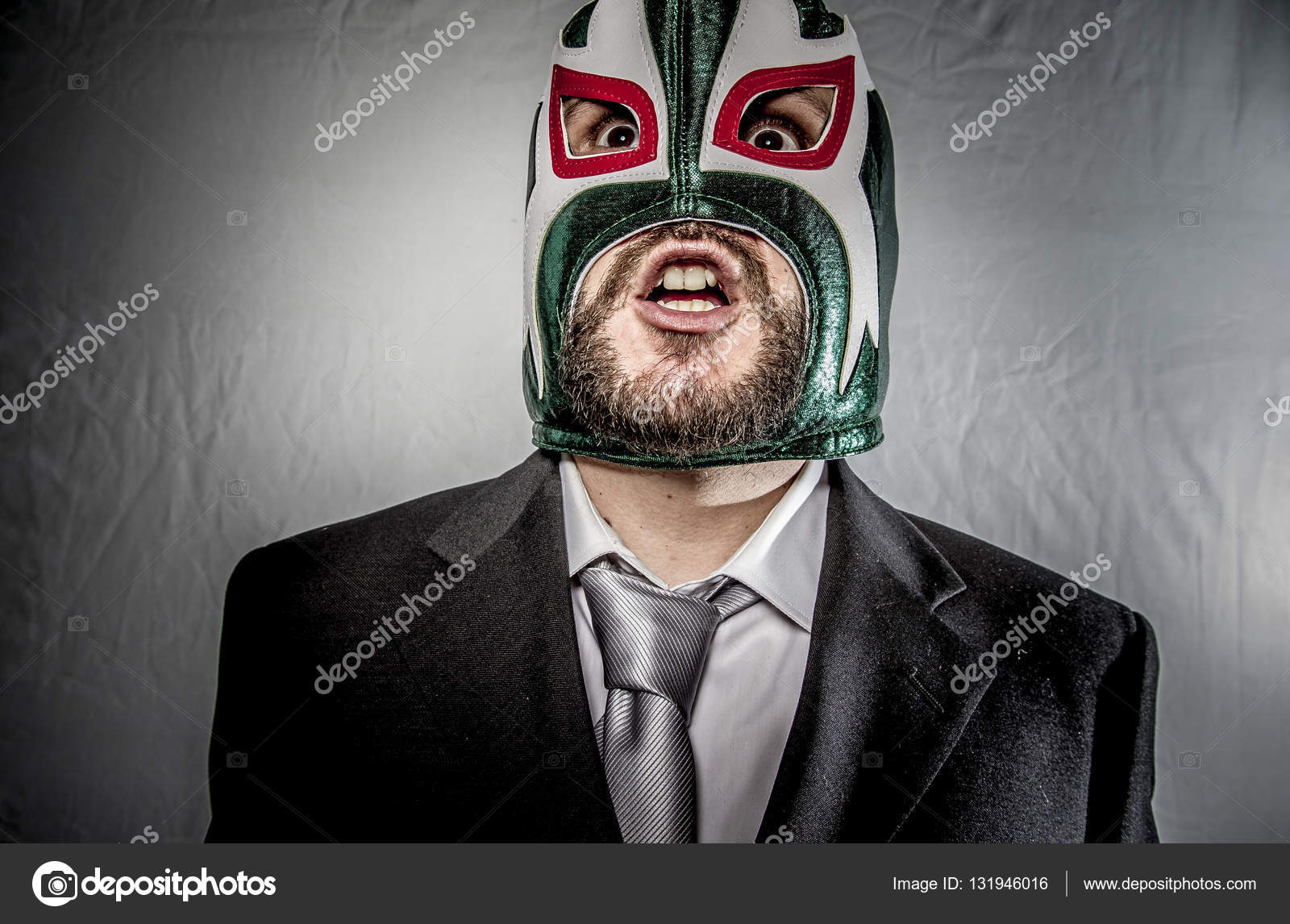 Angry businessman with mask of Mexican fighter Stock Photo by ...