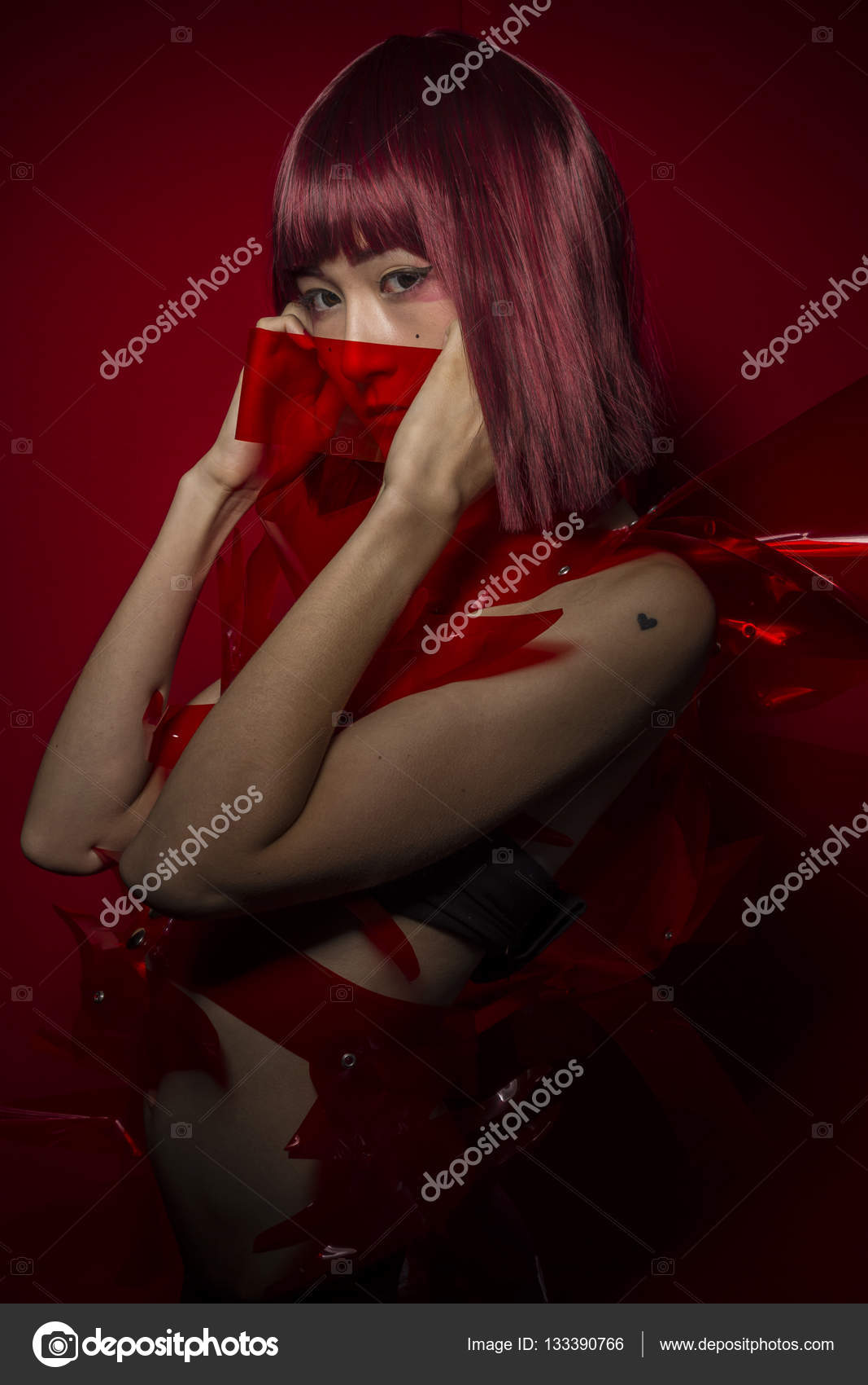 Oriental girl with red plastic costume — Stock Photo © outsiderzone ...