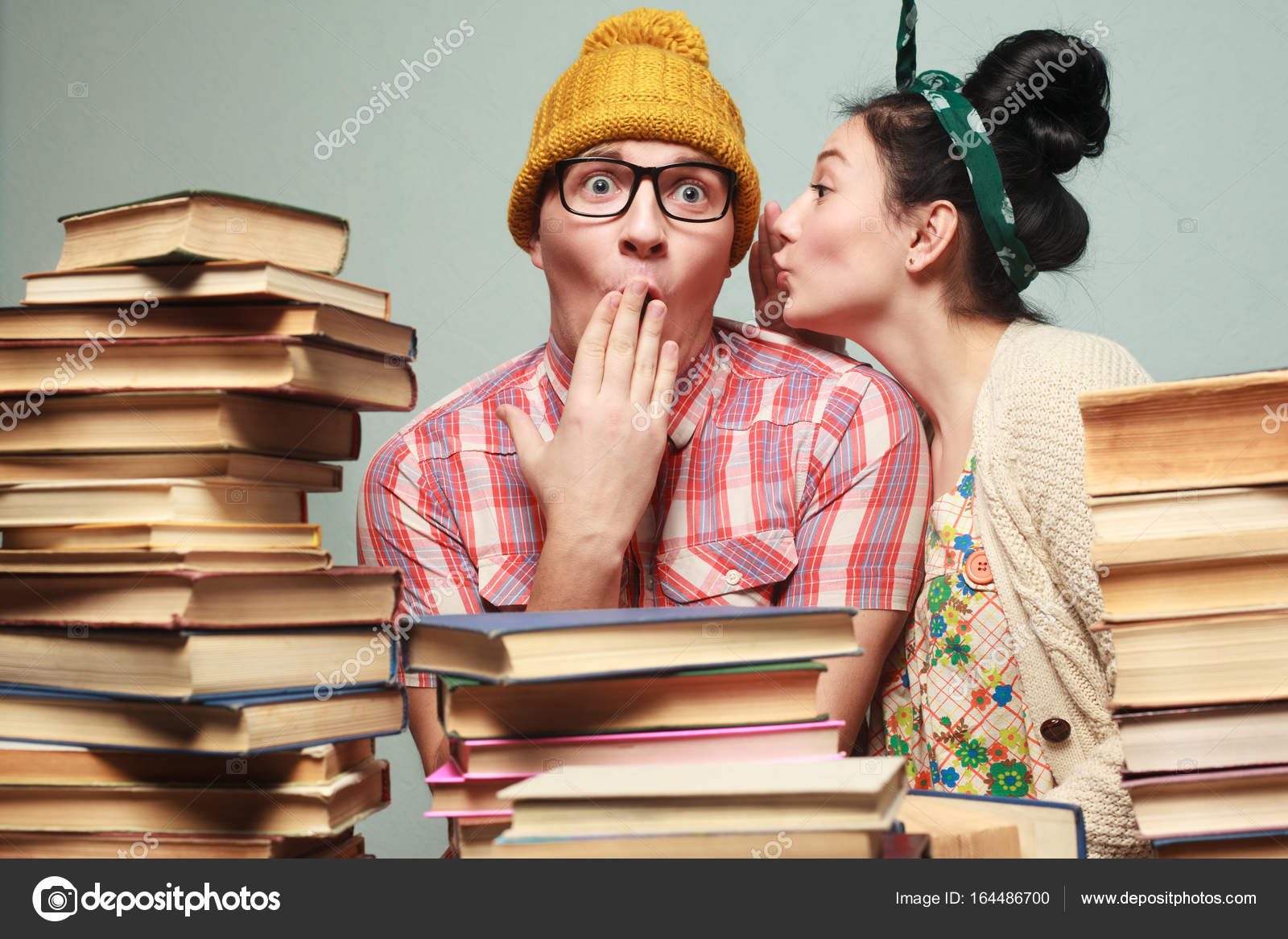 Couple of nerd students preparing to exam — Stock Photo © lsapaleva ...