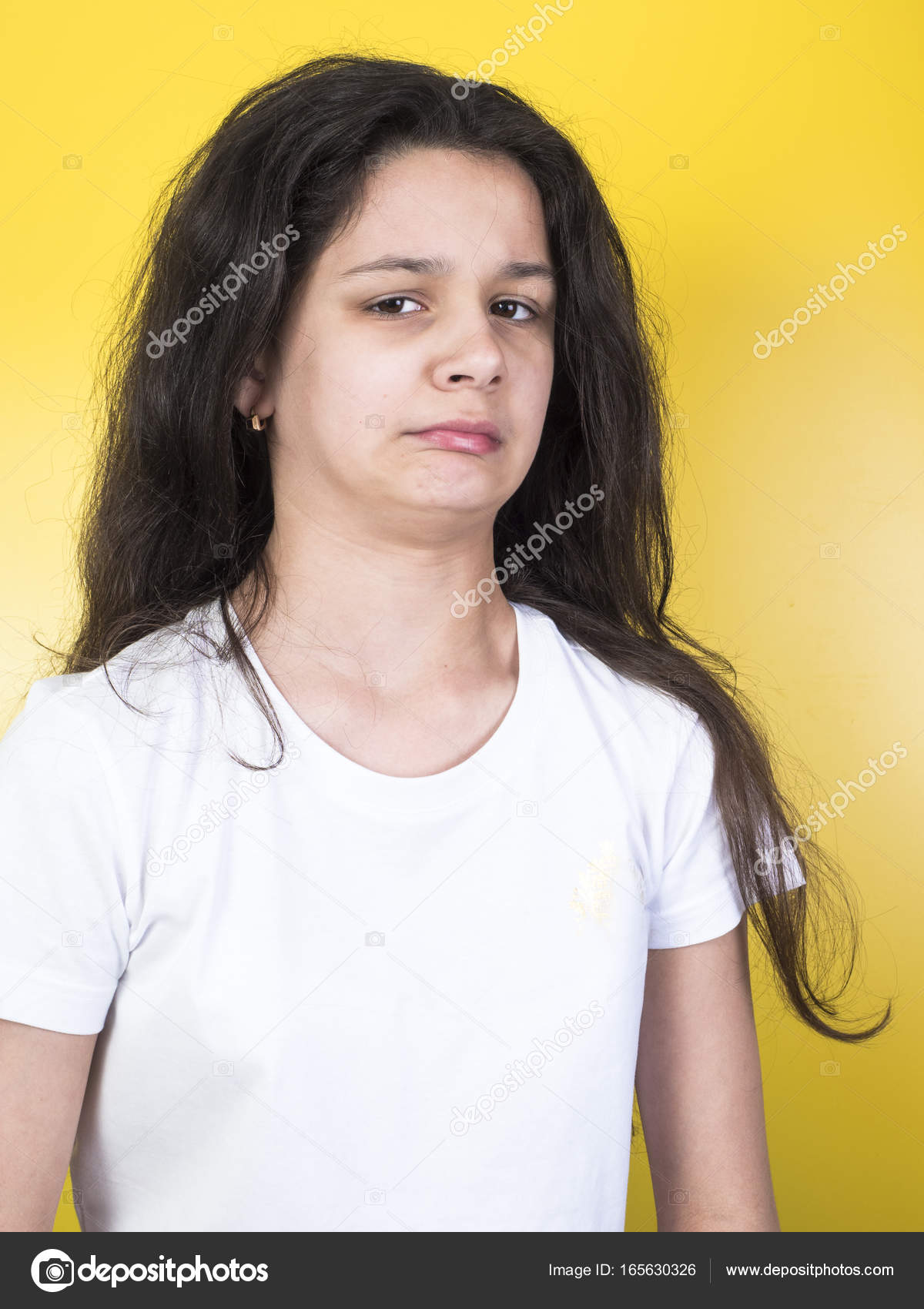 Girl disgusted face expression. Yellow background. — Stock Photo ...