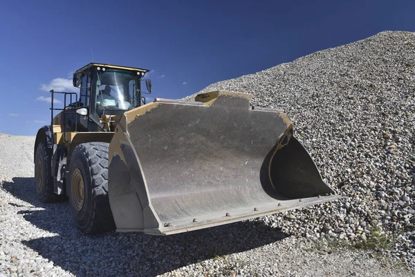 Skid loader gravel Stock Photos, Royalty Free Skid loader gravel Images ...