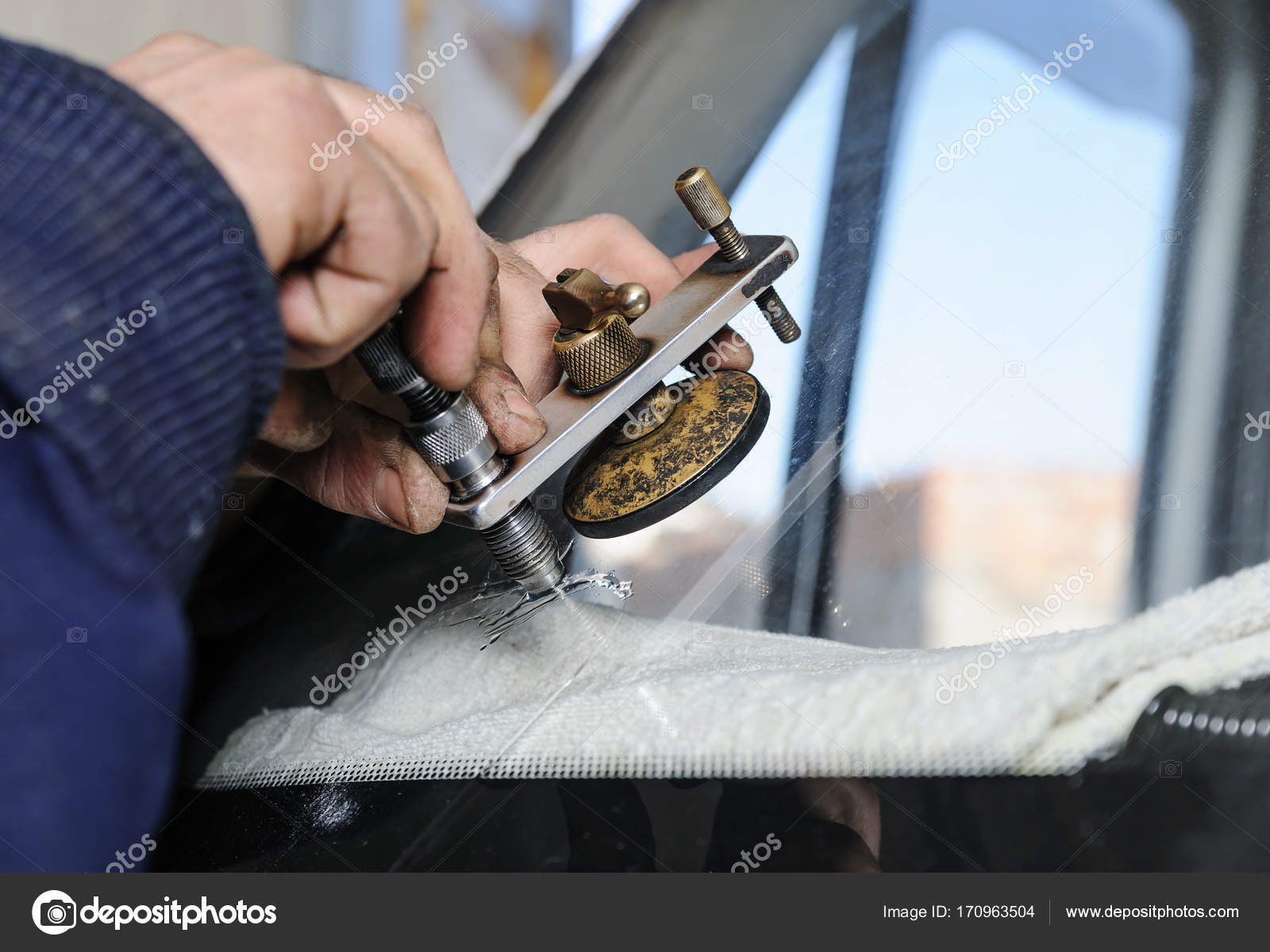 Repair cracked windshield. Stock Photo by ©Yunava1 170963504