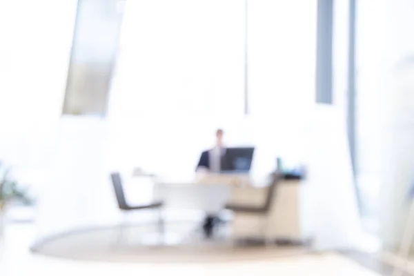Blurred office background , office worker on the computer — Stock Photo ...