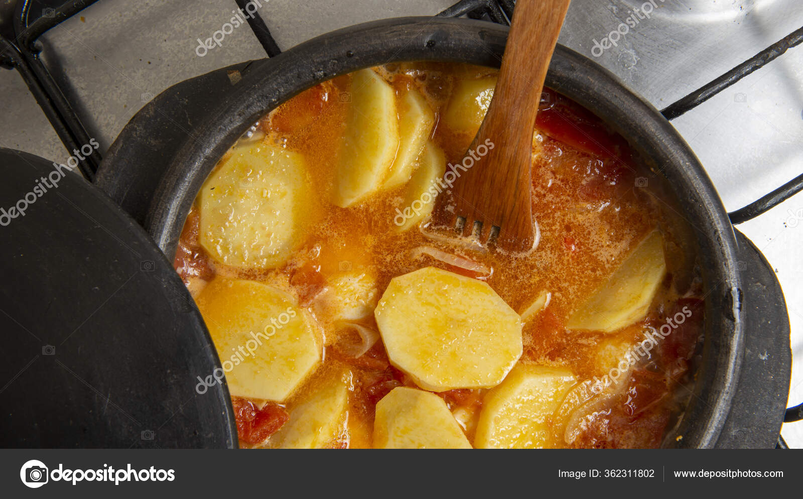 Fish Being Cooked Clay Pot Tomato Sauce Stock Photo by ©celsopupo 362311802