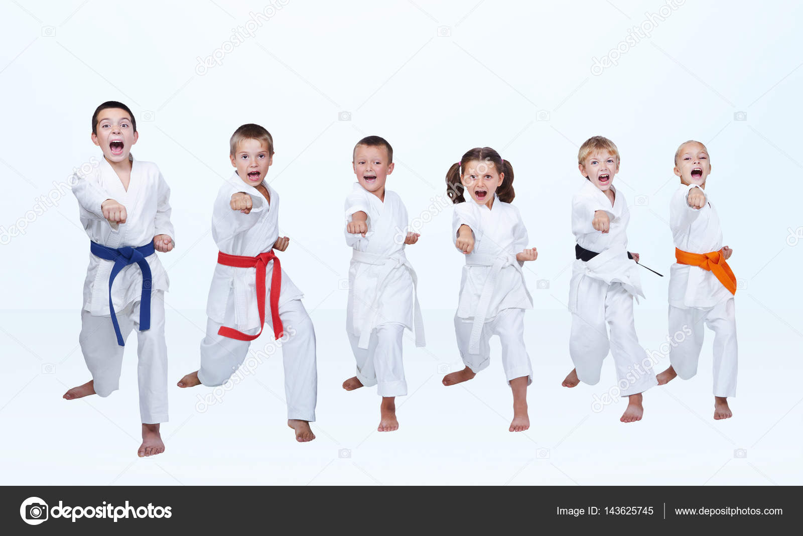 On a light background six karateka beating punch arm Stock Photo by ...