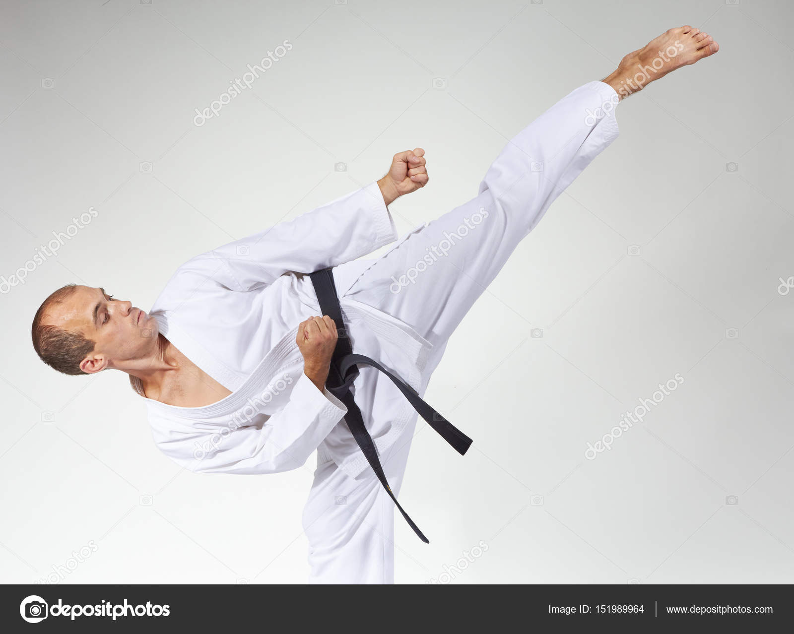 Master beats a high kick with a black belt Stock Photo by ©Andreyfire ...