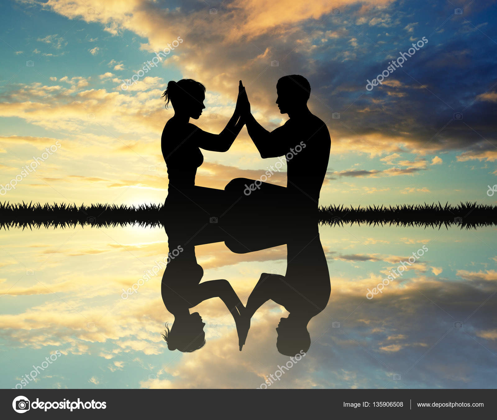 Couple doing yoga at sunset — Stock Photo © adrenalina #135906508 Couple doing yoga at sunset — Stock Photo © adrenalina #135906508