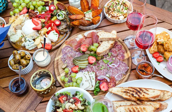 Table full of tasty food Stock Photo by ©telesniuk 161921534